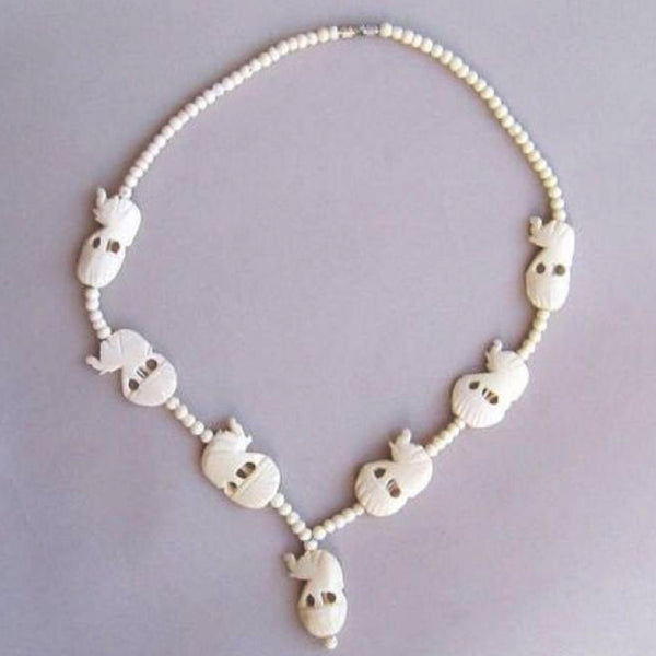 JR 122 - Necklace, Bone 7 Elephants – India Overseas Trading Corporation
